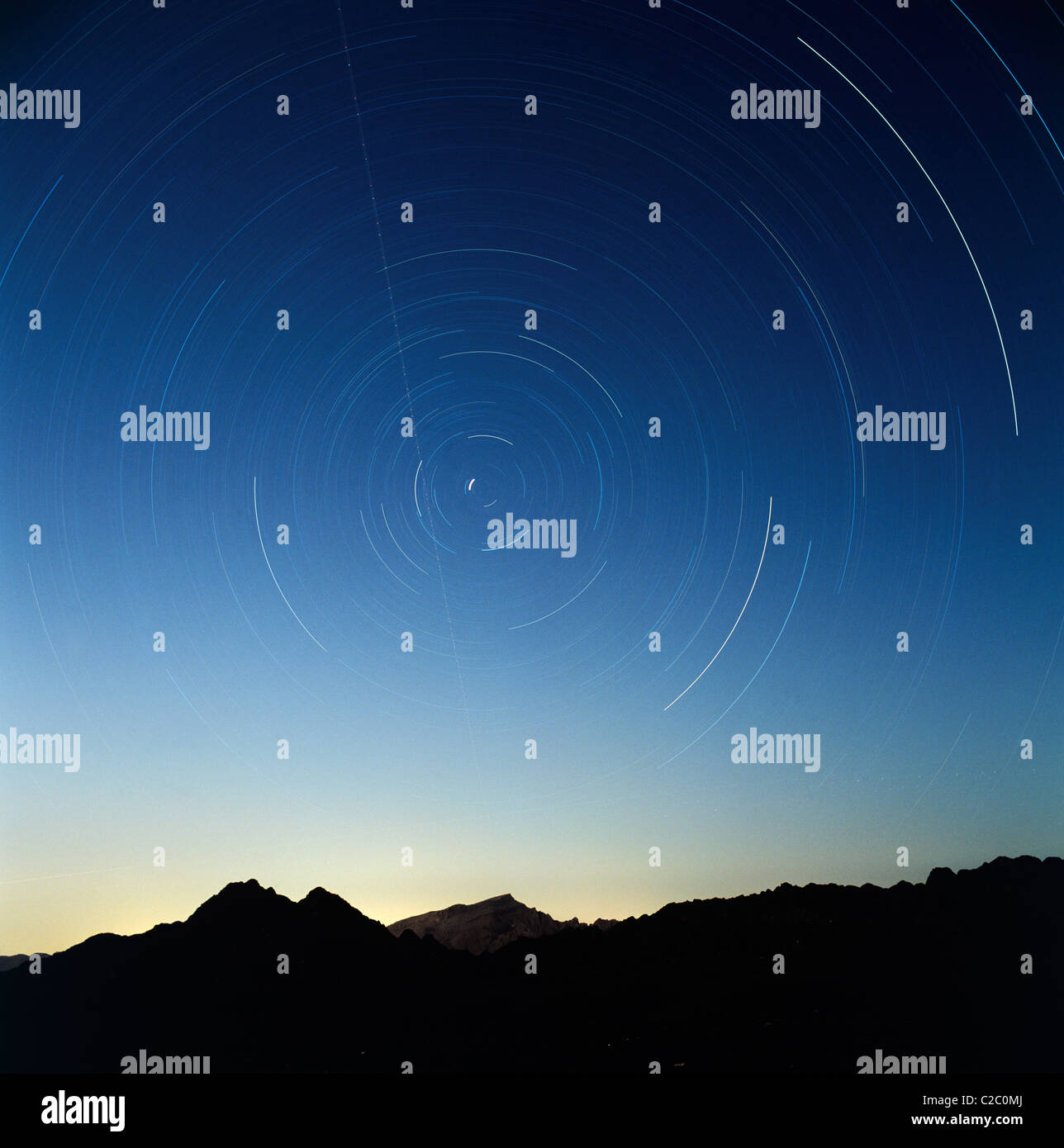 Long exposure from fixed position shows path of stars around North Star ...