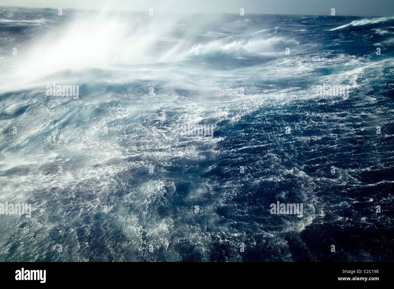 Gale force winds lash huge ocean waves into a violent stretch of water ...