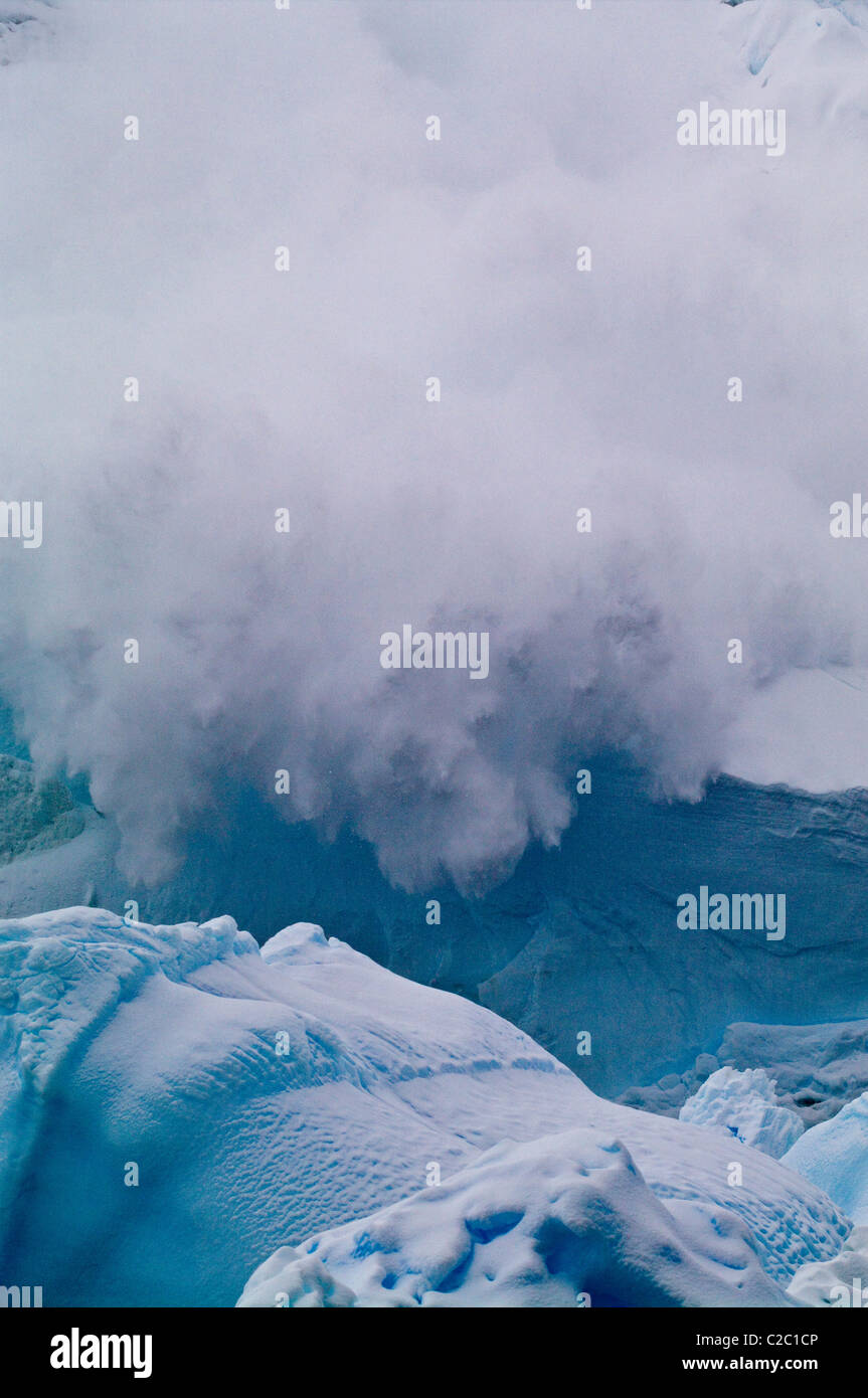 An avalanche of snow and ice crashes down a mountainside in Antarctica ...