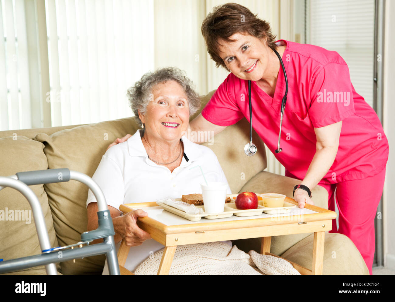 Friendly nurse brings a mean to an elderly shut-in. Could also be lunch ...