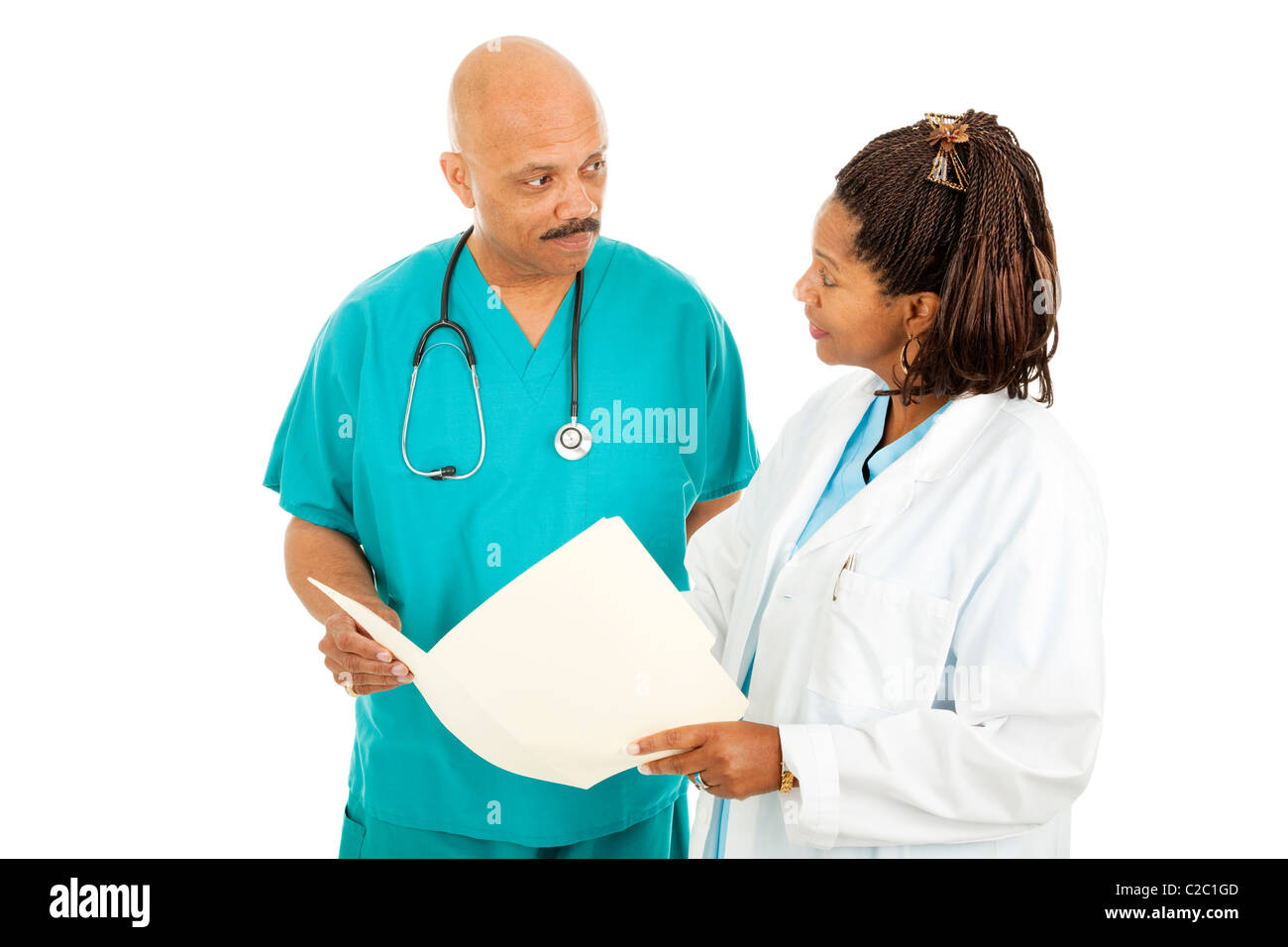 Attractive african-american medical doctors read a patient's chart ...