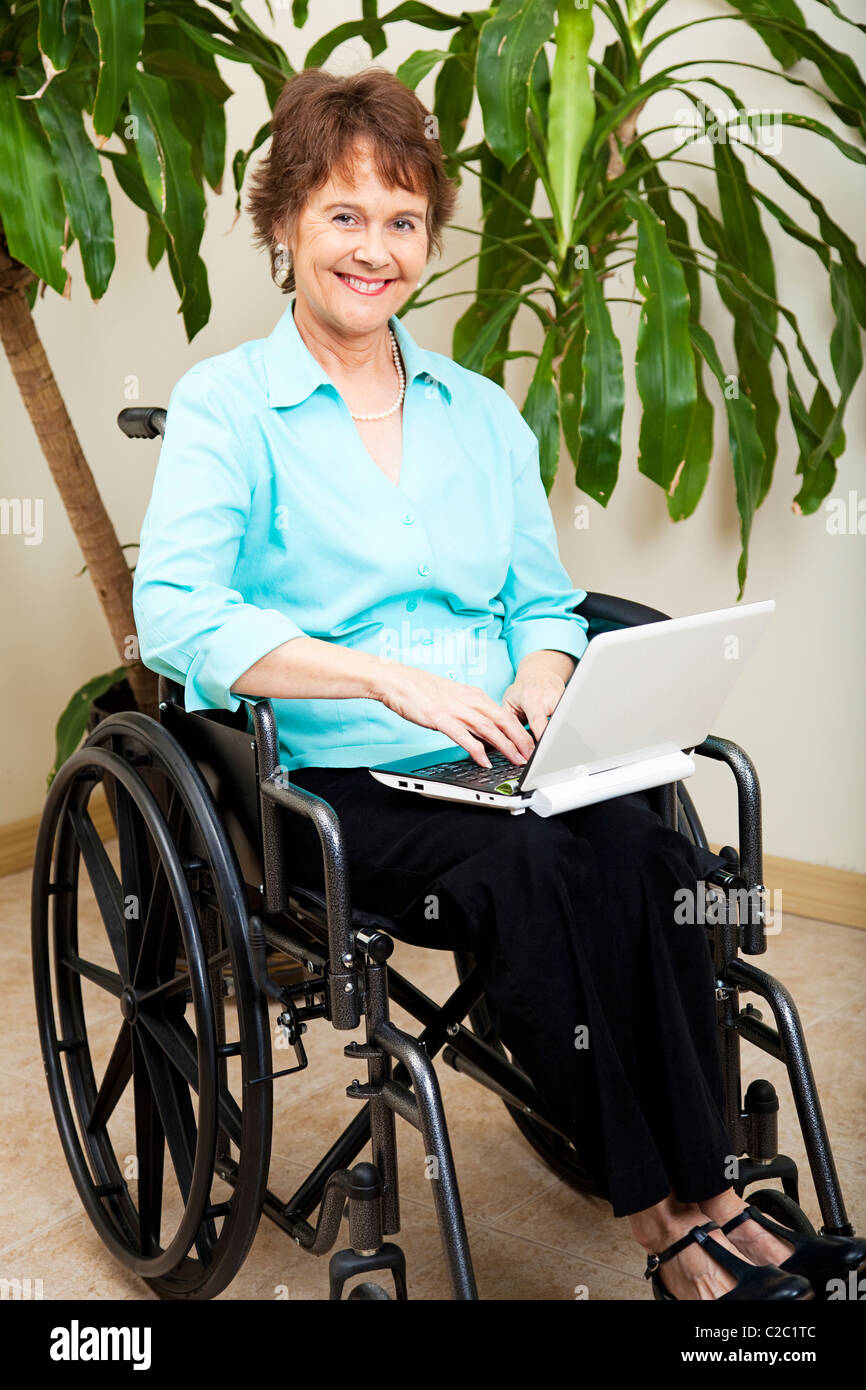 Female secretary wheelchair hi-res stock photography and images - Alamy