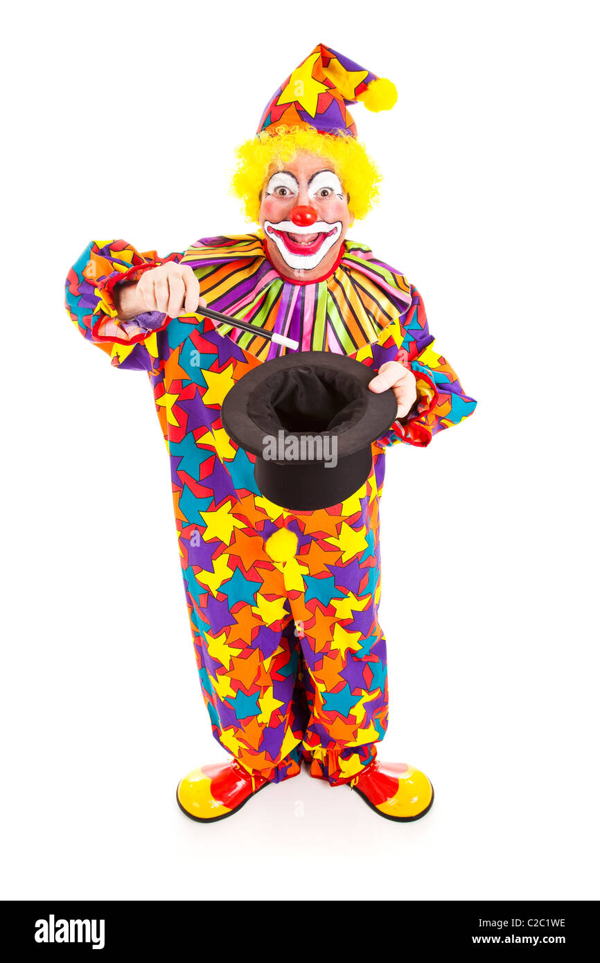 Birthday clown does a magic trick. Full body isolated on white Stock ...