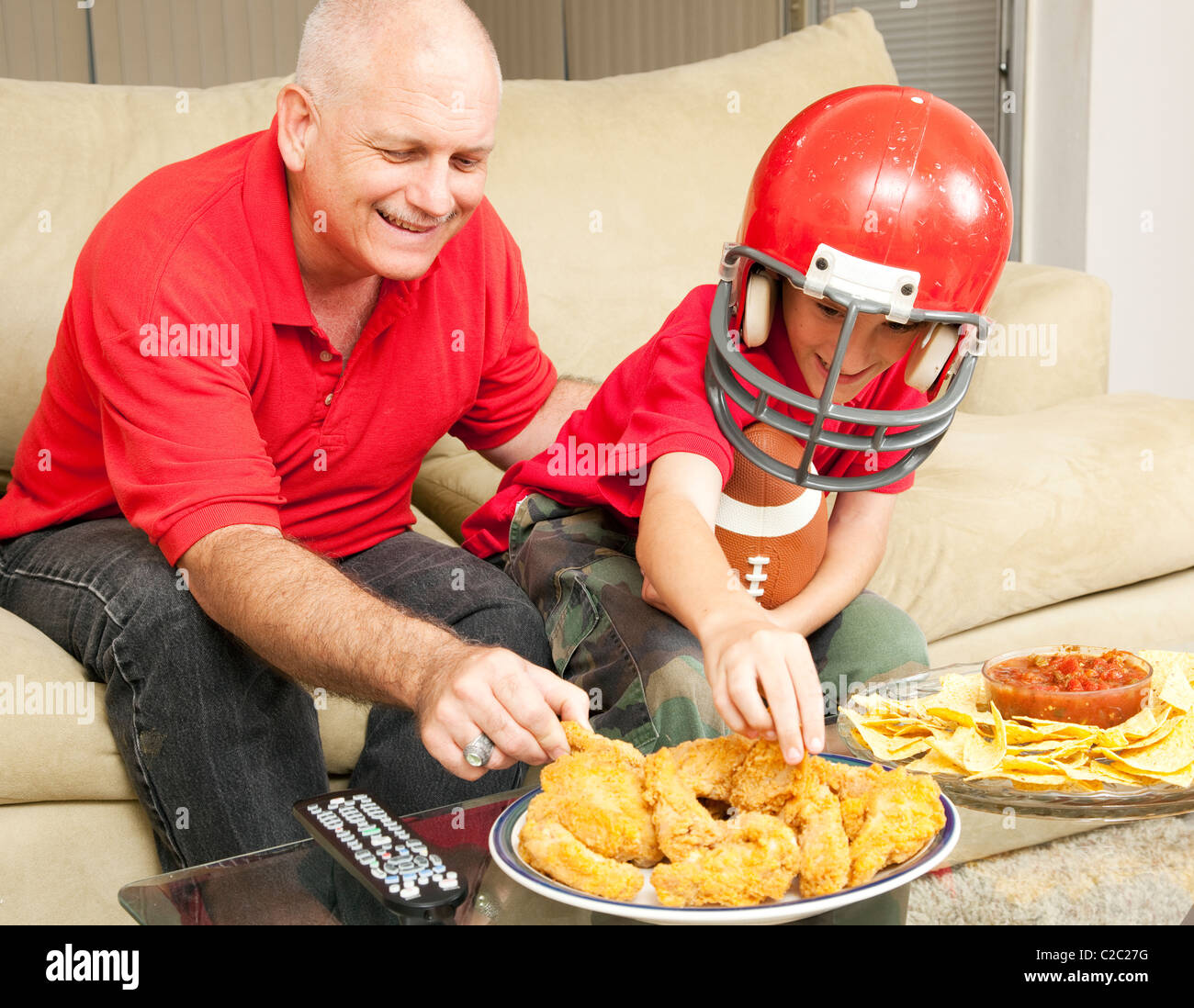 Child eating snacks game hi-res stock photography and images - Alamy