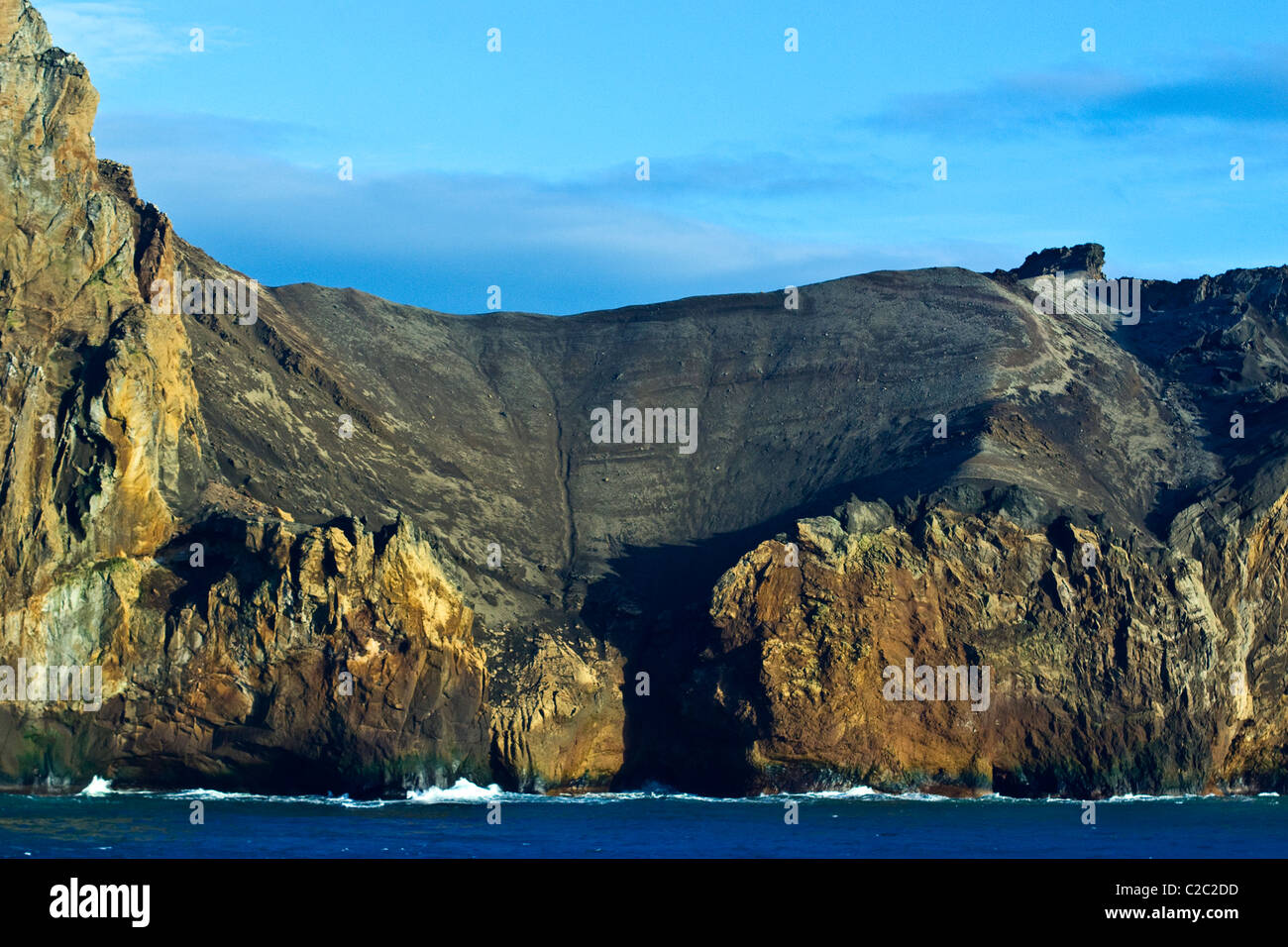 A rugged cliff face and escarpment surrounding a volcanic caldera Stock ...