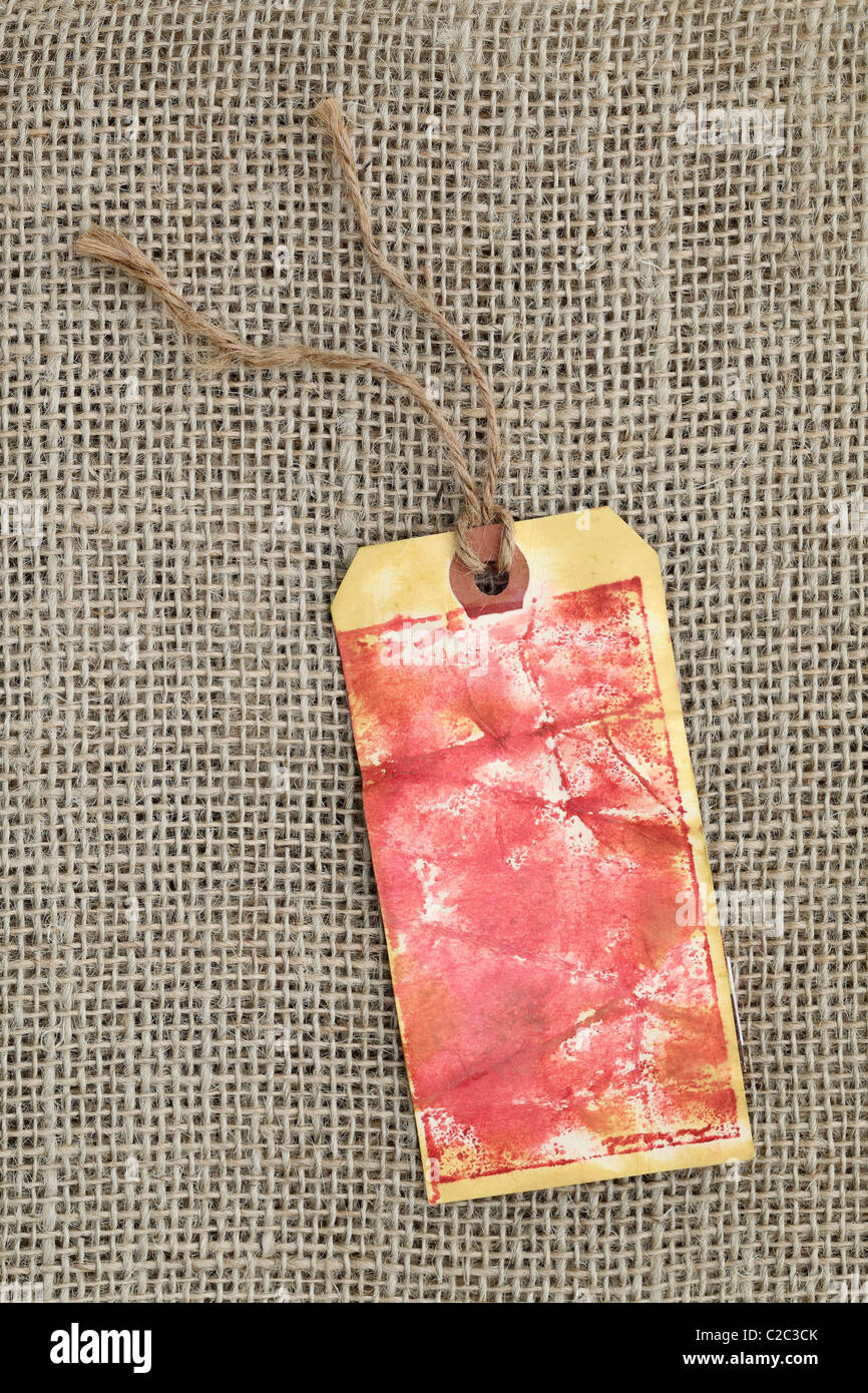 Blank labels on burlap background Stock Photo - Alamy