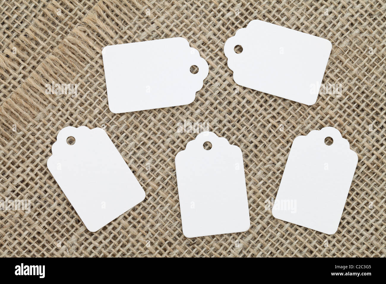 Blank labels on burlap background Stock Photo - Alamy