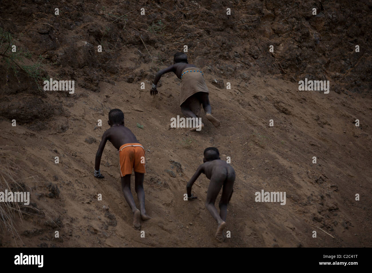 Mursi tribal children playing in Mursi Village, Ethiopia Stock Photo ...