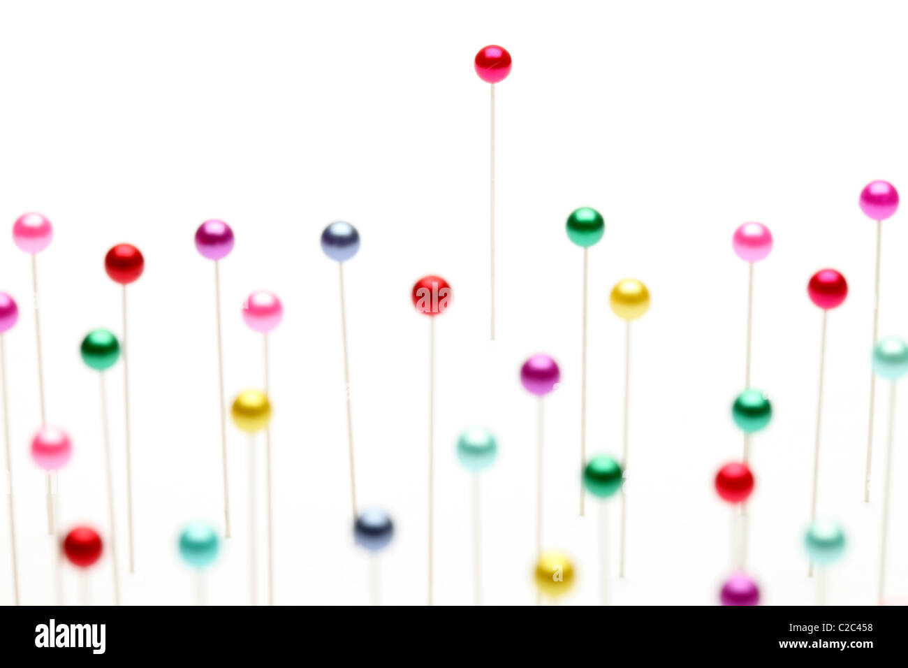 Colorful pins isolated on white background Stock Photo - Alamy