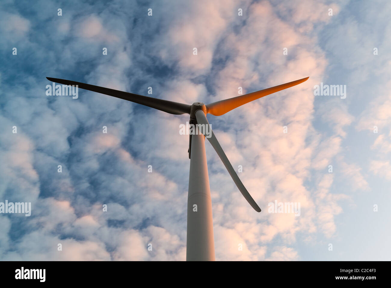 View of single windmill generating electricity against sunset sky Stock ...
