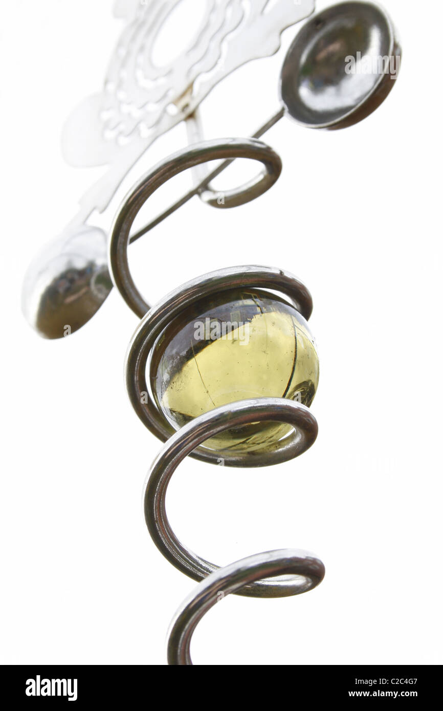spiral wind ornament with glass ball Stock Photo - Alamy