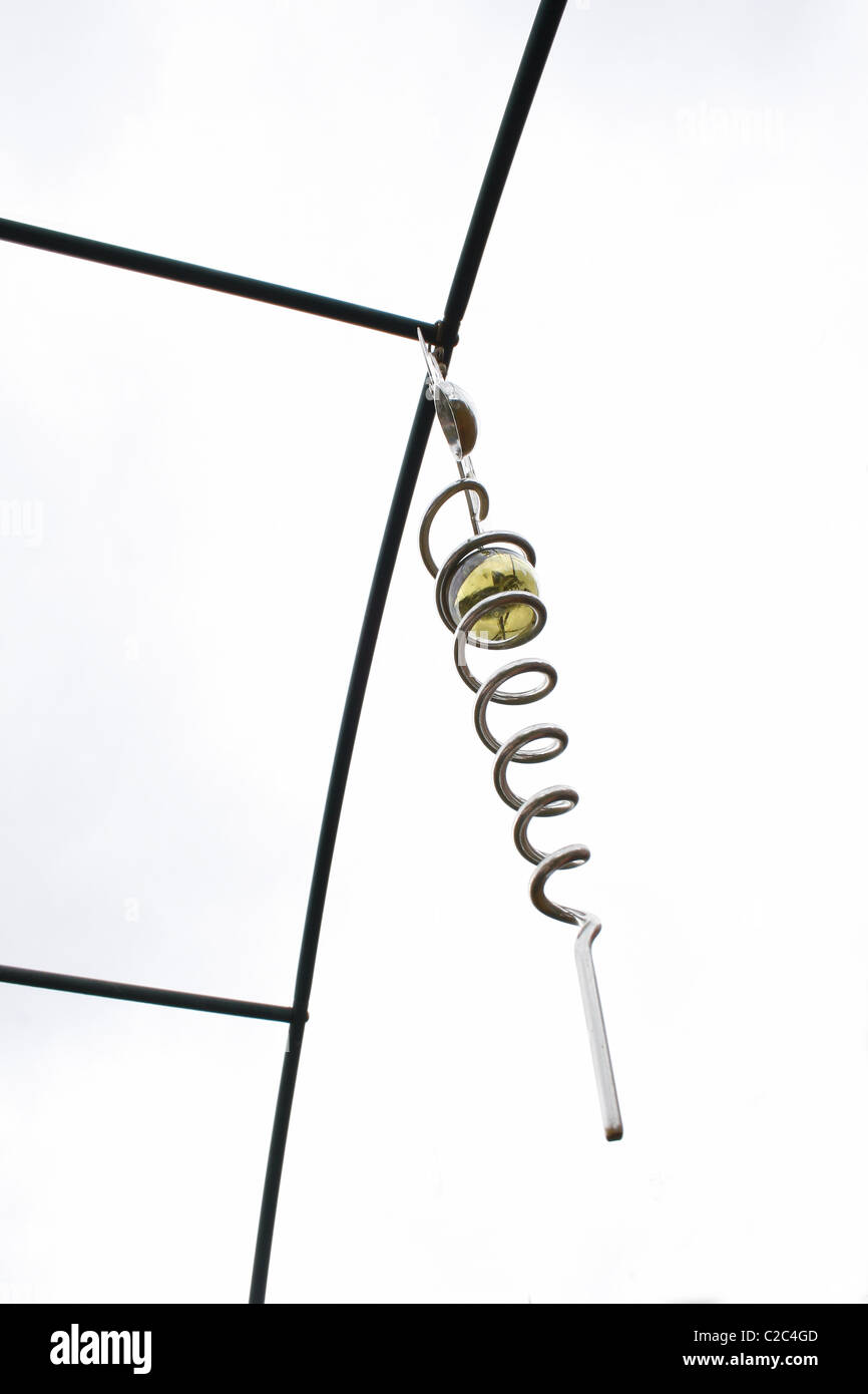 spiral wind ornament with glass ball Stock Photo - Alamy
