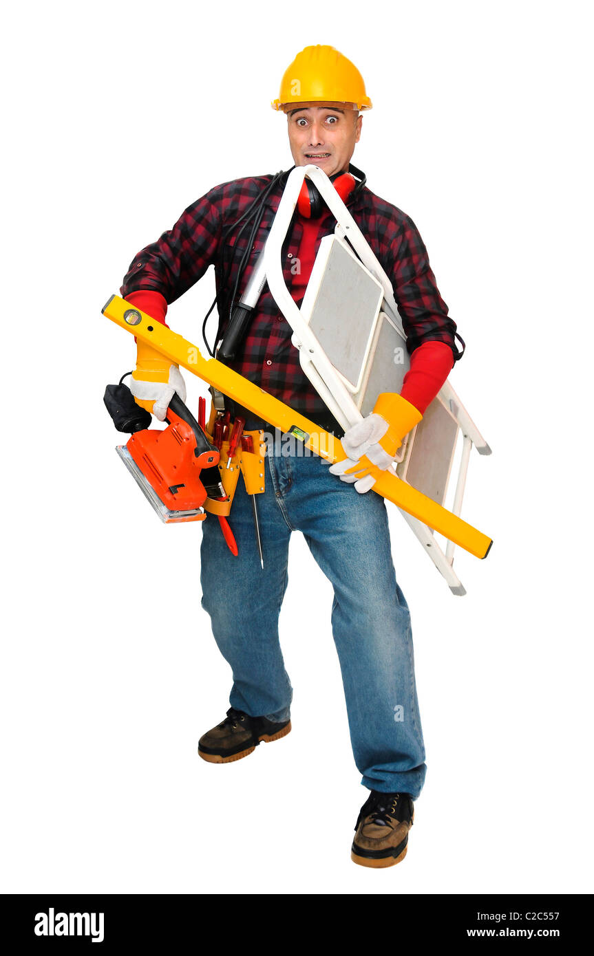 Stressed construction worker with lots of tools isolated in white Stock ...