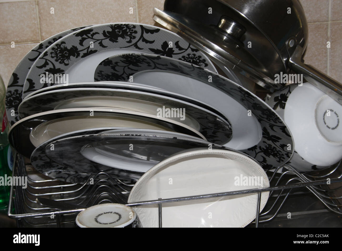 plates drying on draining board in kitchen Stock Photo - Alamy