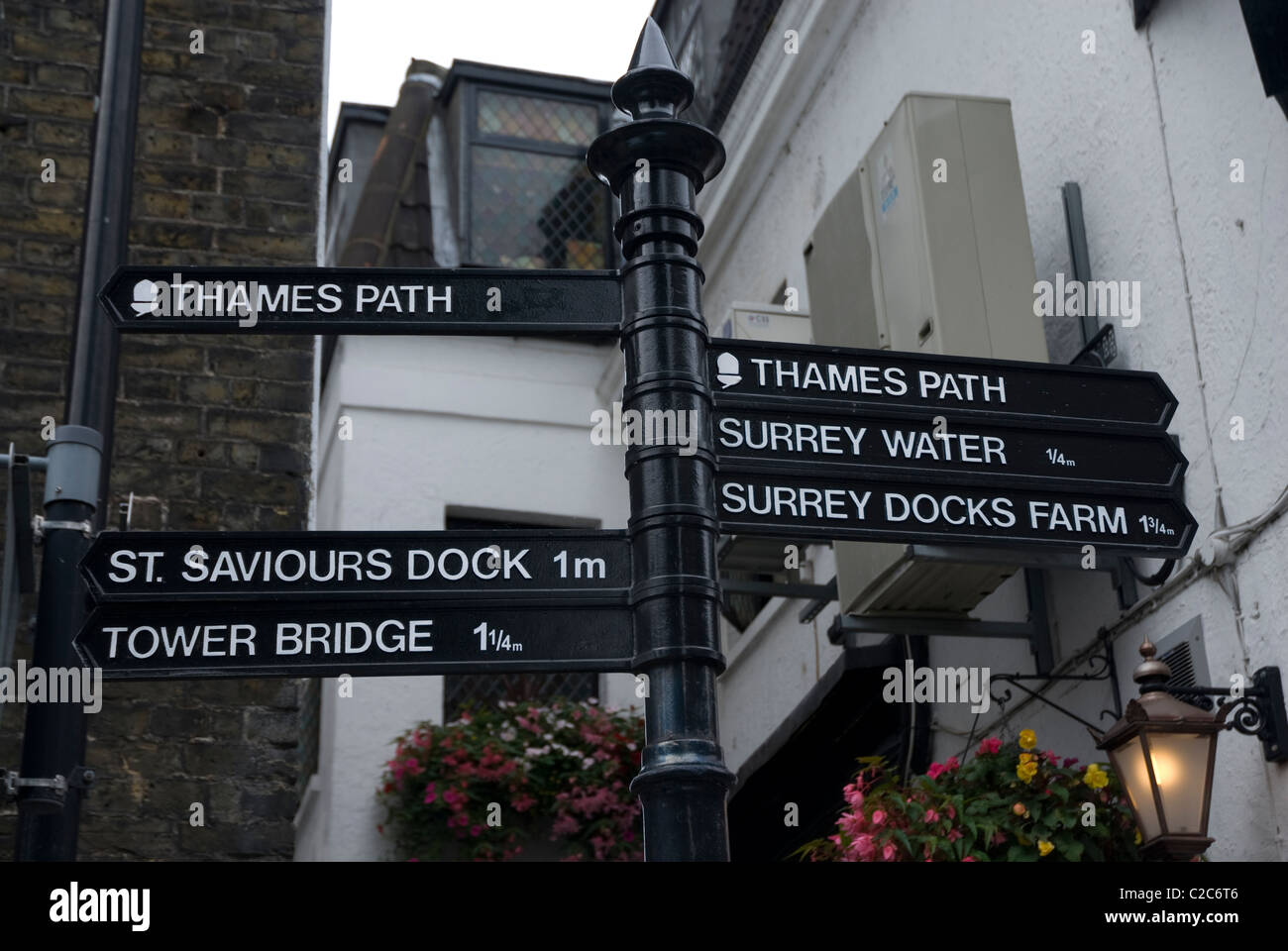 A signpost pointing directions in Rotherhithe, London SE1 Stock Photo ...