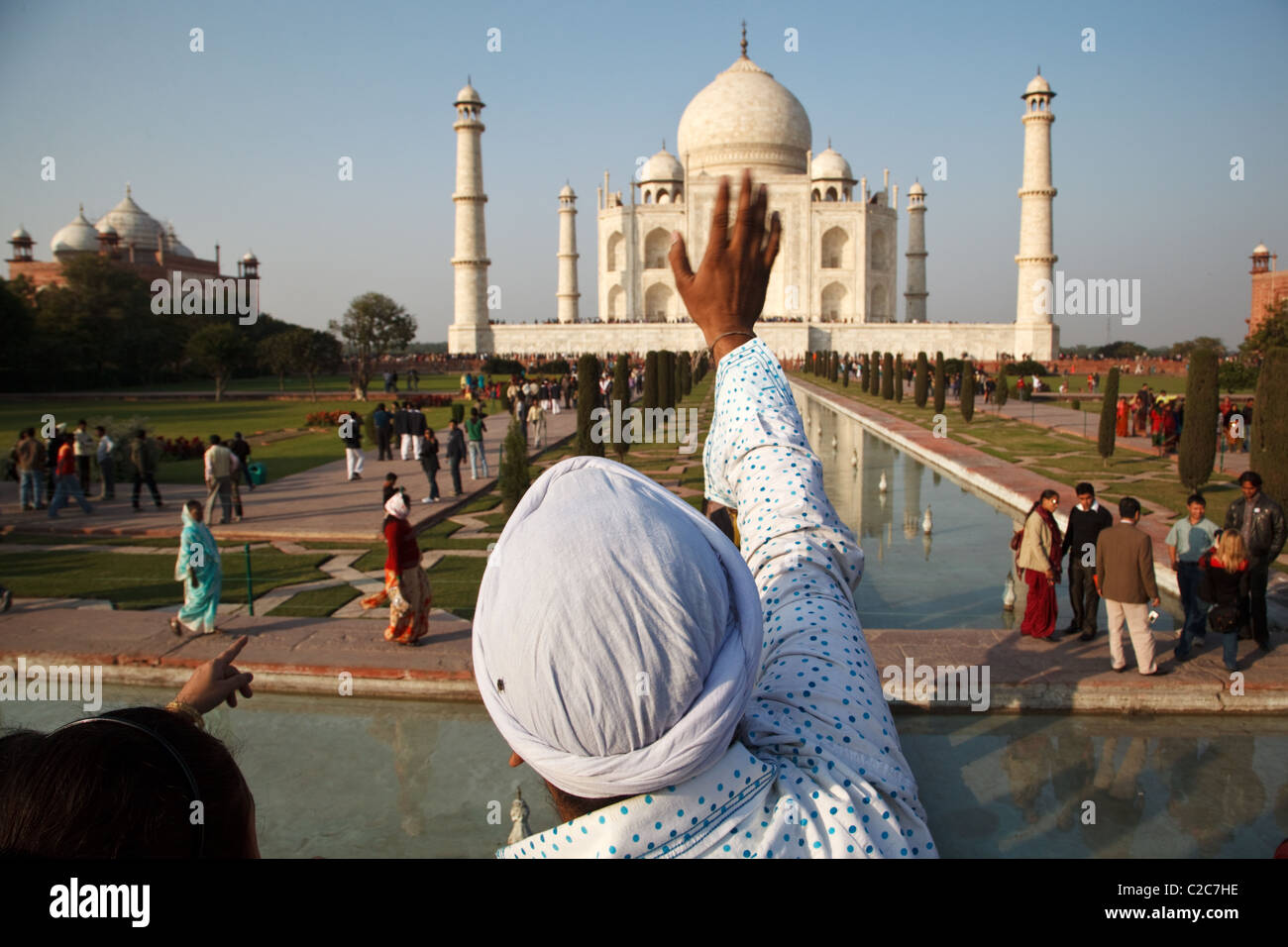 A Sikh man waves his hand in front of Taj Mahal in Agra, India Stock ... A Sikh man waves his hand in front of Taj Mahal in Agra, India Stock ...
