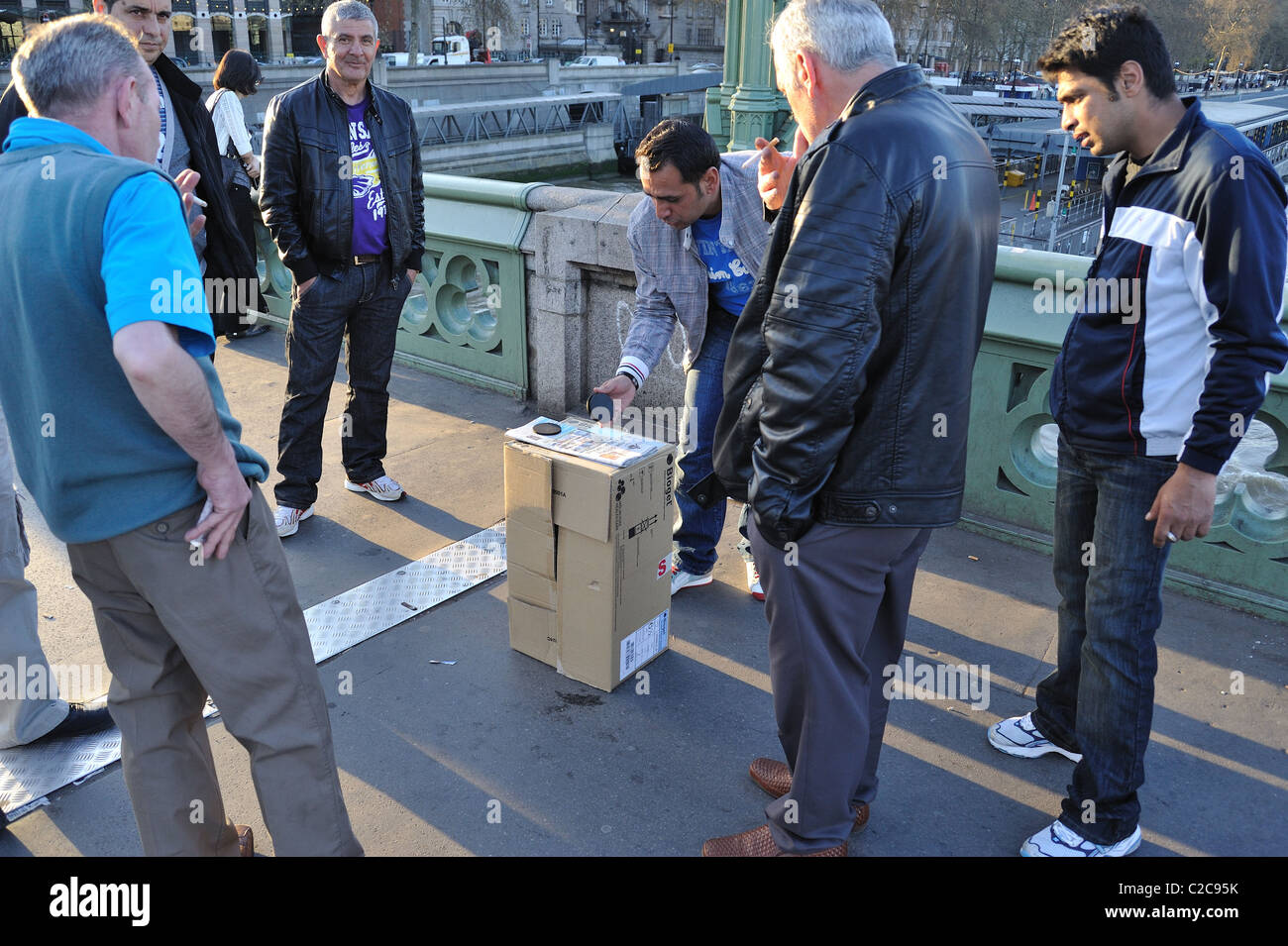 Con Artists working on Westminster Bridge London Stock Photo - Alamy