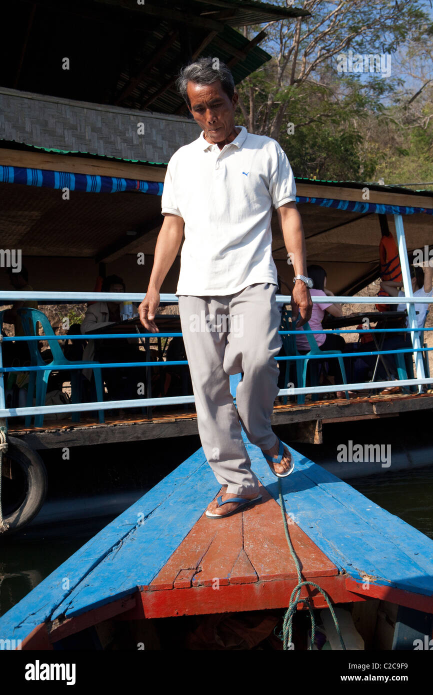 Boat man in Siam lake in Lampang, Thailand Stock Photo - Alamy