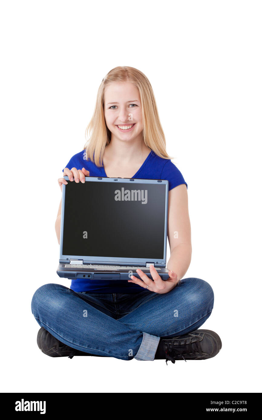 Young, beautiful, blond woman holding computer with ad space. Isolated ...