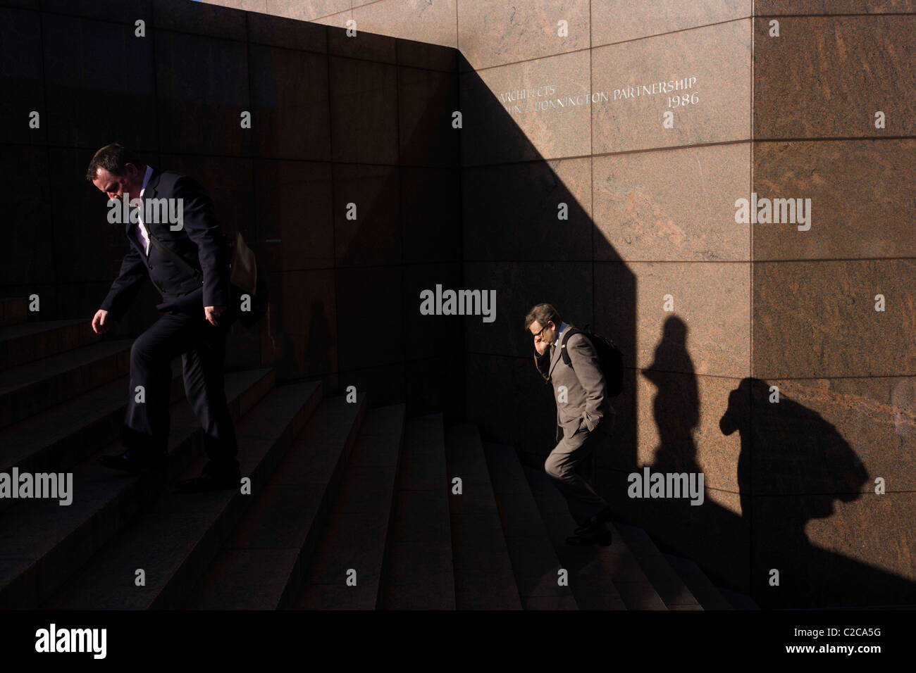Commuters london bridge behind hi-res stock photography and images - Alamy