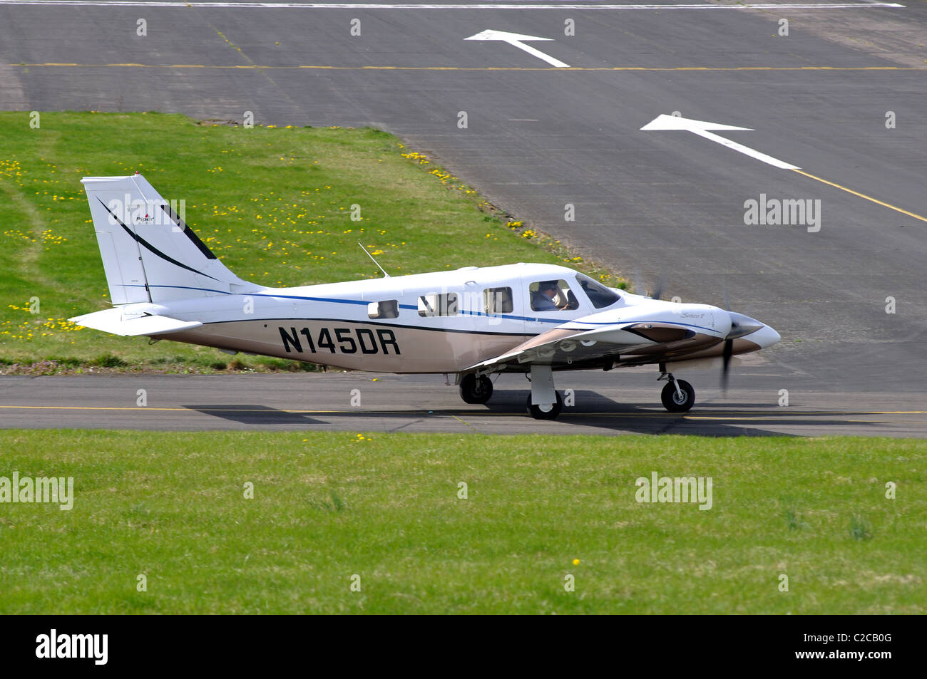 Piper PA34 Seneca taxiing at Gloucester Airport, UK Stock Photo - Alamy
