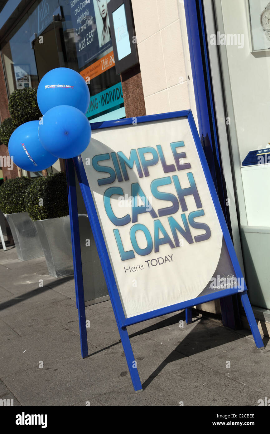 Cash loans available at a store in a U.K. city Stock Photo - Alamy
