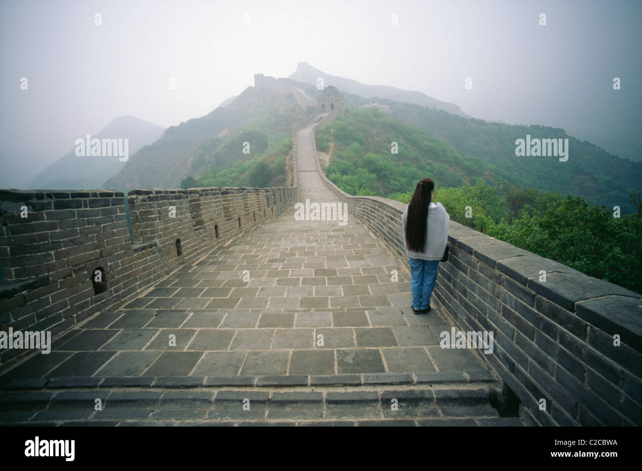 Woman looking over wall, Great Wall, Beijing, China, Asia Stock Photo ...