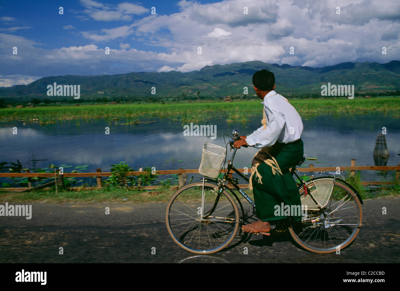 Man wearing sarong on bike hi-res stock photography and images - Alamy