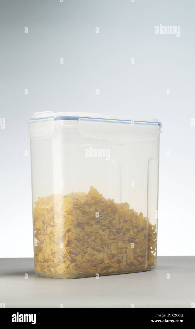 Cornflakes in a plastic container Stock Photo - Alamy