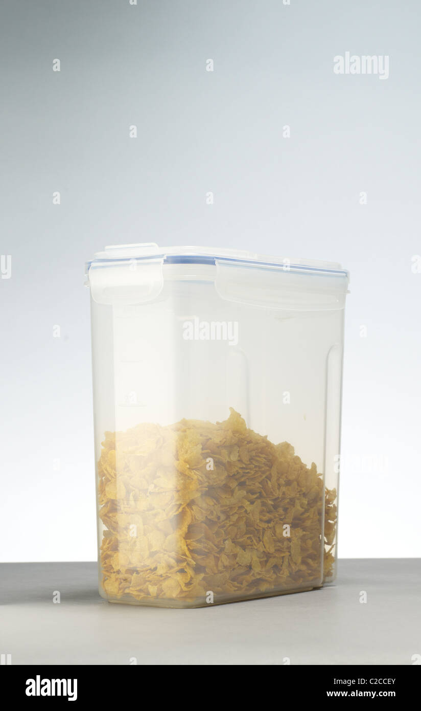 Cornflakes in a plastic container Stock Photo - Alamy