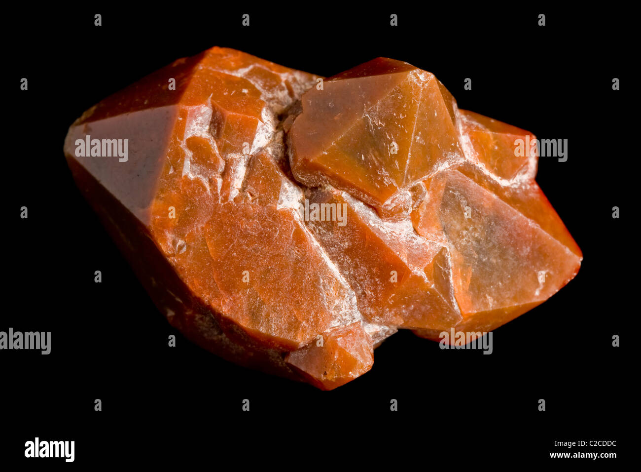Red quartz (SiO2) crystal Stock Photo - Alamy
