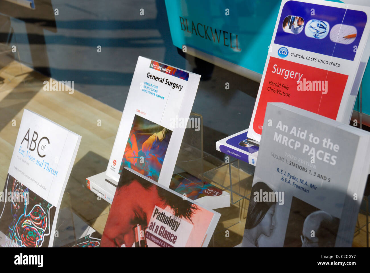 Books on medicine on display in a UK shop window Stock Photo - Alamy