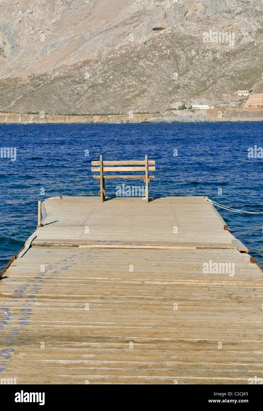 bench on jetty - Telendos Island - Greece Stock Photo - Alamy