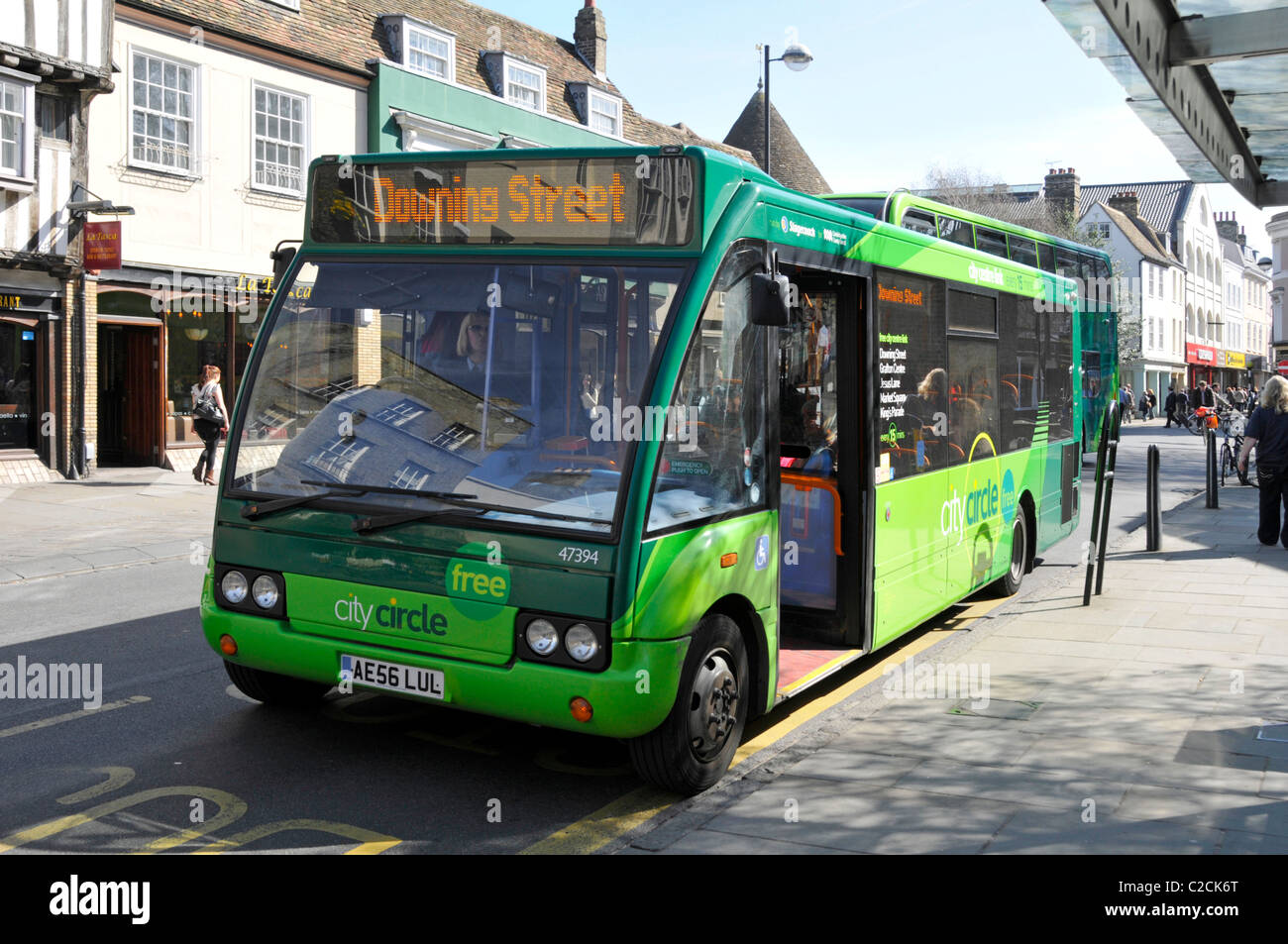 Free City centre circular bus service waiting at stop Stock Photo - Alamy