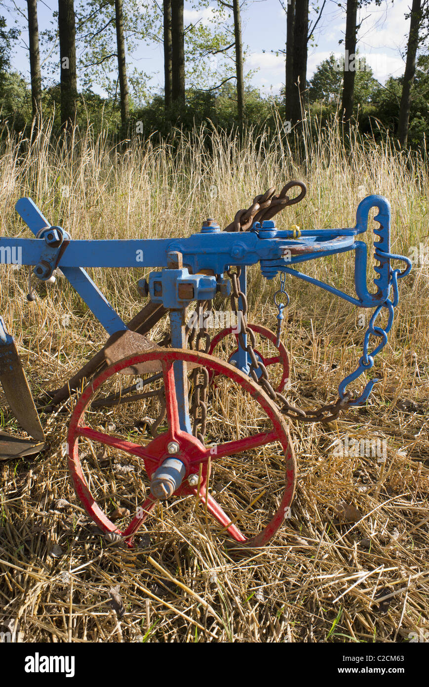 old antique plough in field Stock Photo - Alamy