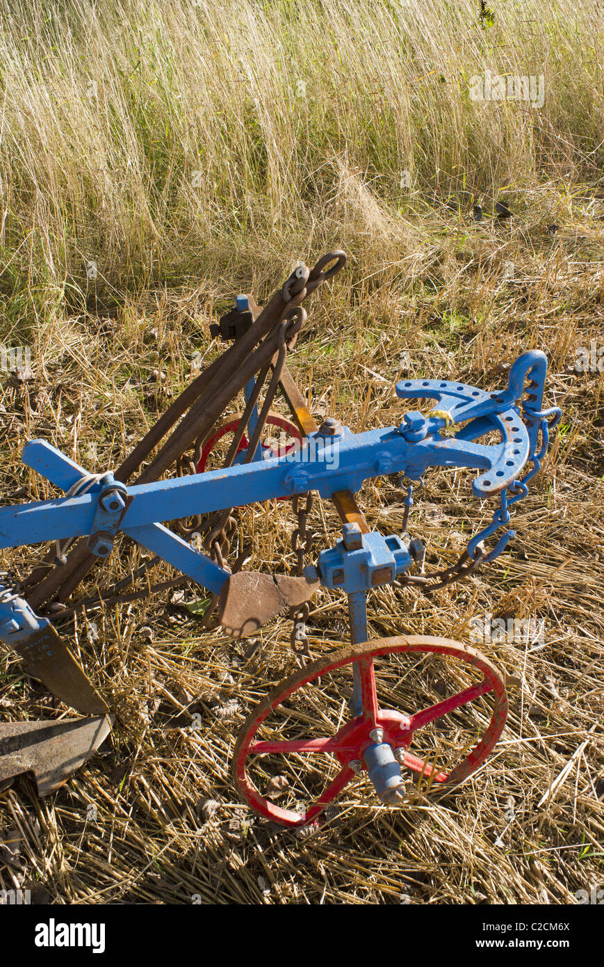 old antique plough in field Stock Photo - Alamy