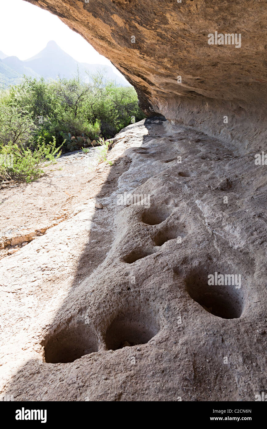 Prehistoric bedrock mortar holes at Cuevas Amarillas rock shelter Big ...