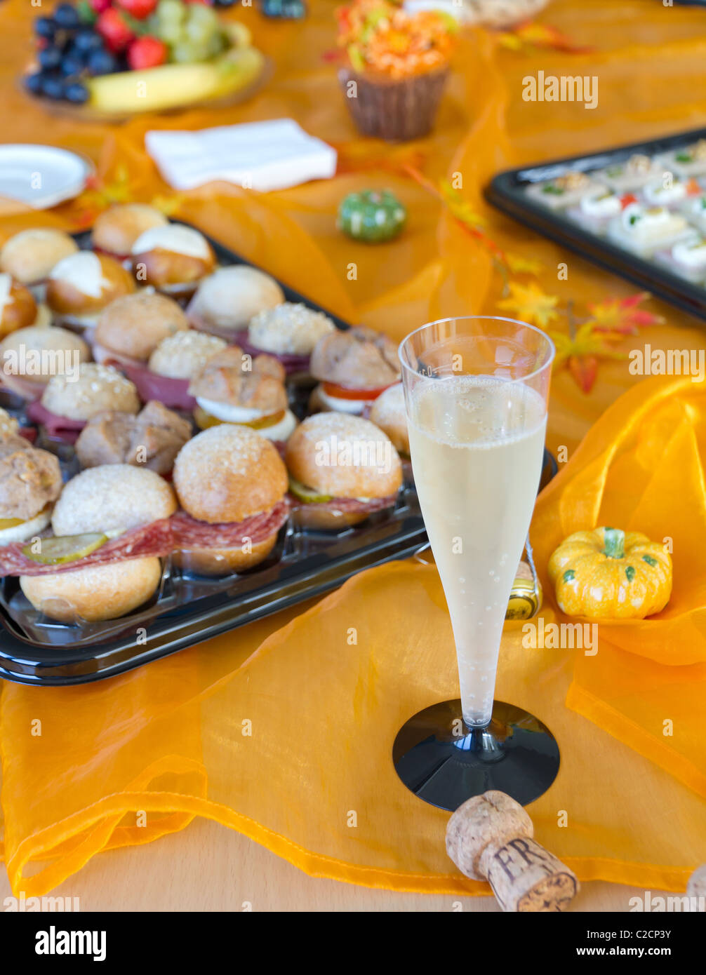 Office meeting buffet with sparkling wine and sandwiches to celebrate ...