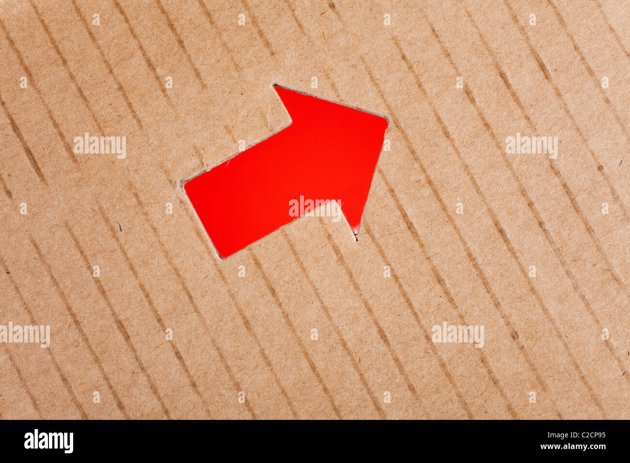 Arrow Sign and cardboard for background Stock Photo - Alamy