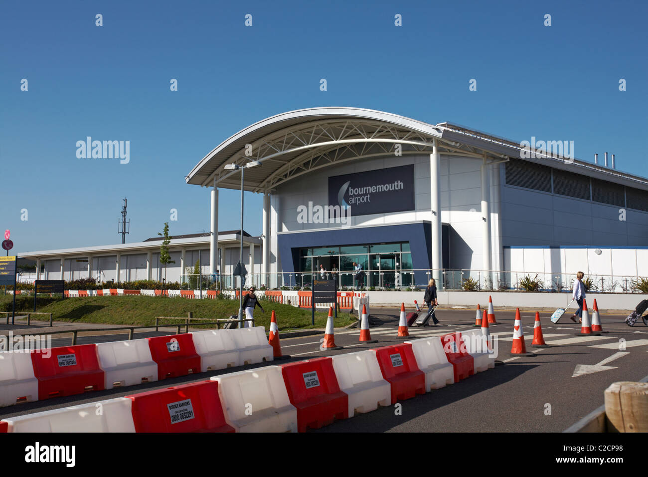 People heading into Bournemouth Airport departures terminal entrance to ...