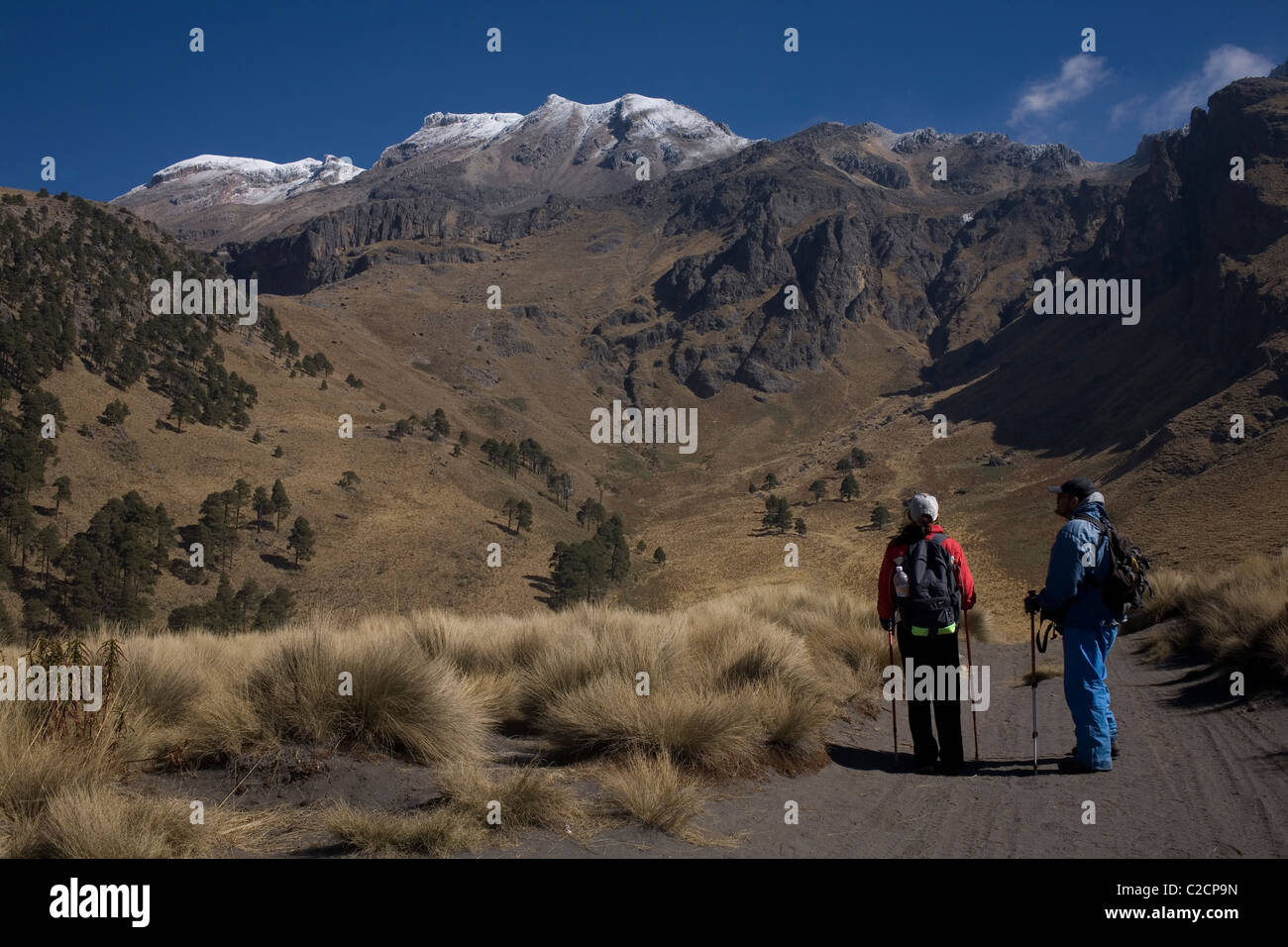 Tourists during a trecking trip to the Volcano "Ixta" in the ...