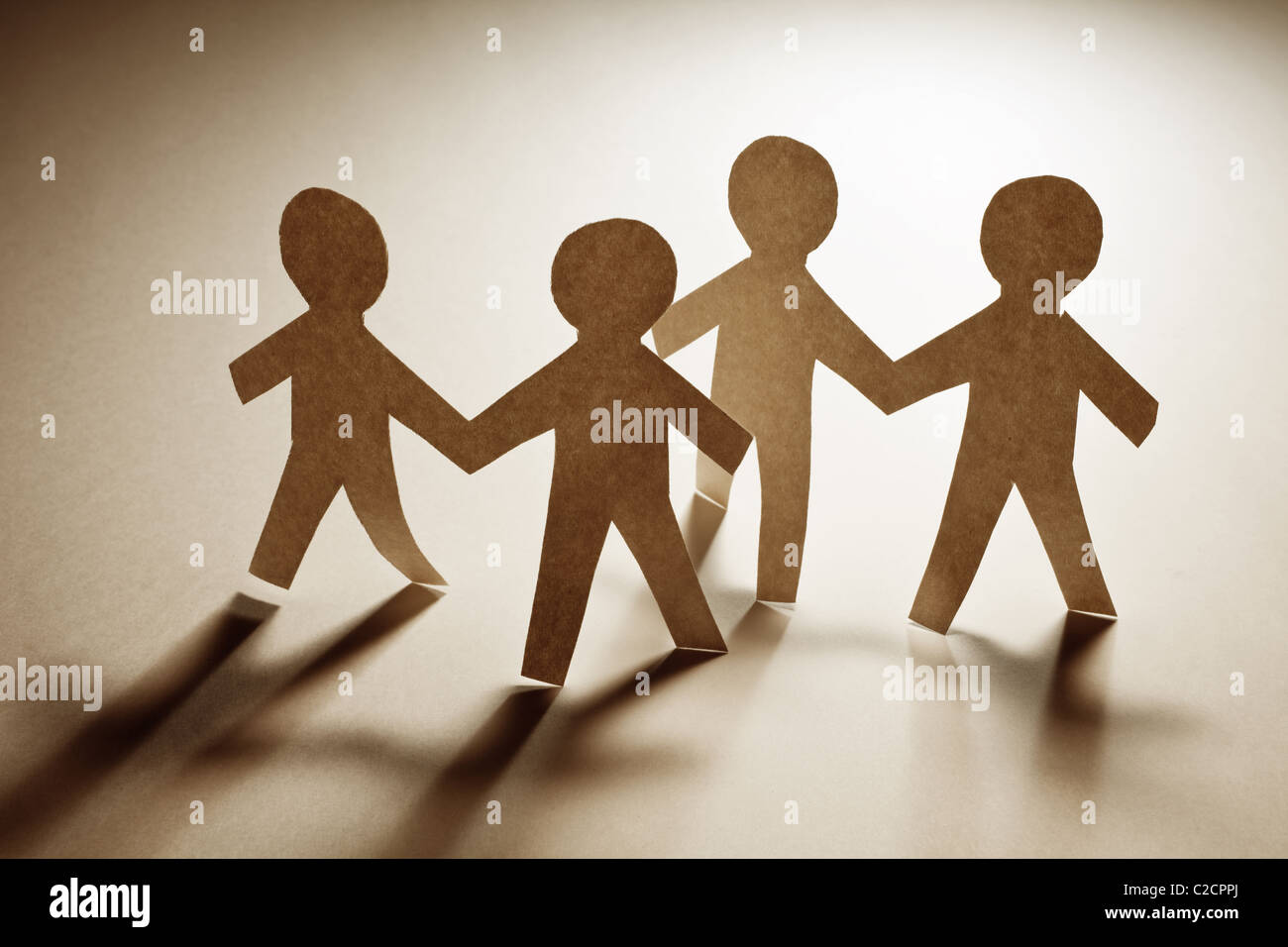 Paper Chain Men, concept of Teamwork Stock Photo - Alamy