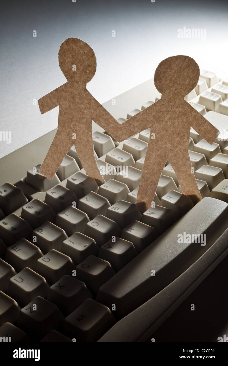 Paper Chain Men, concept of Friendship Stock Photo - Alamy