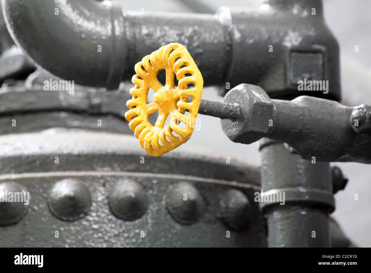 yellow Pipeline valve close up Stock Photo - Alamy