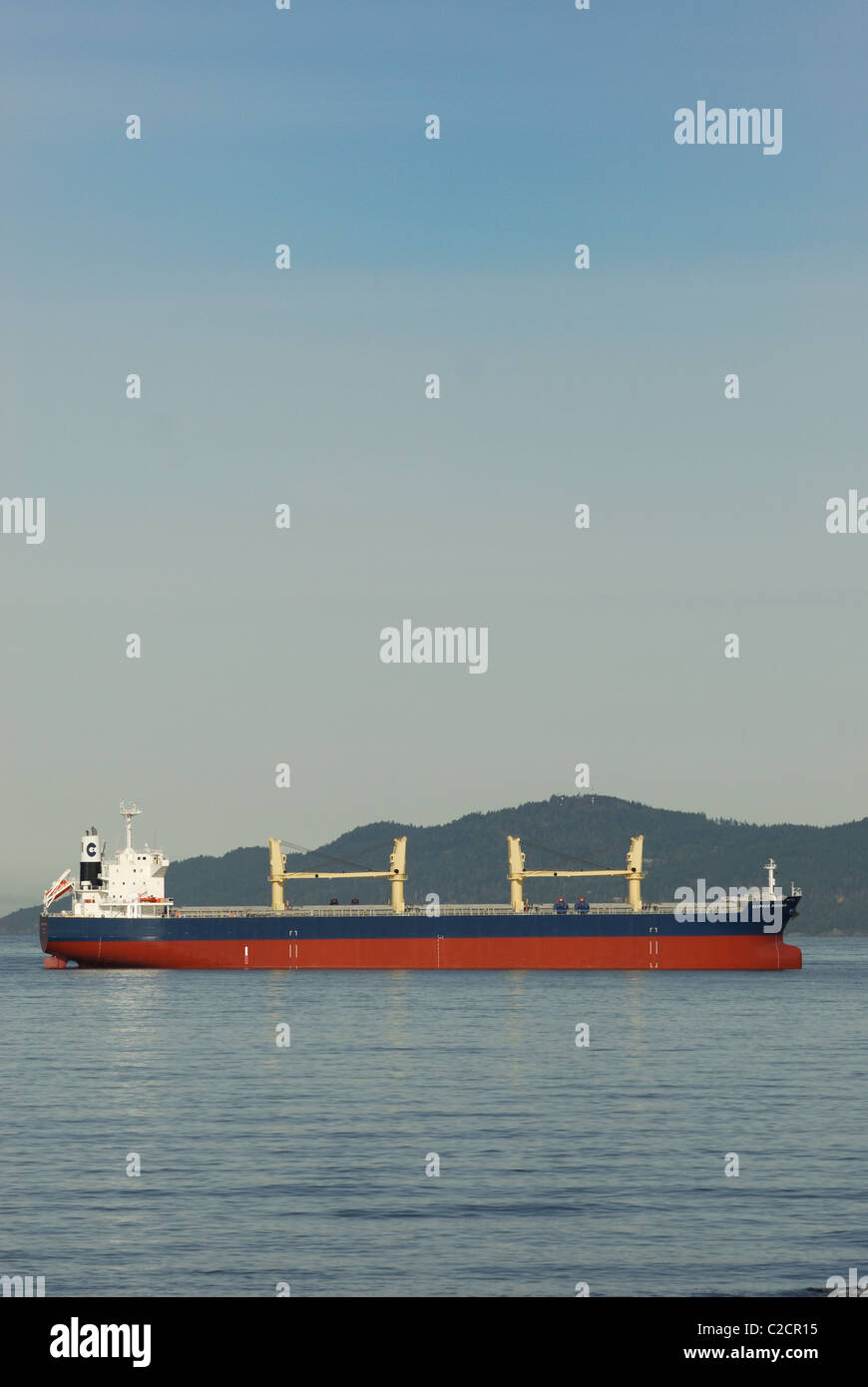 Cargo freighter Clipper Phoenix anchored out in Burrard Inlet ...