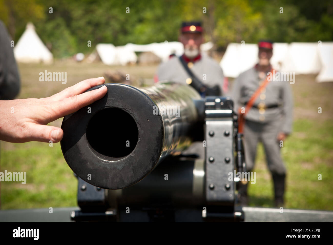 Confederate re-enactors prepare a canon Charleston, SC marking the ...