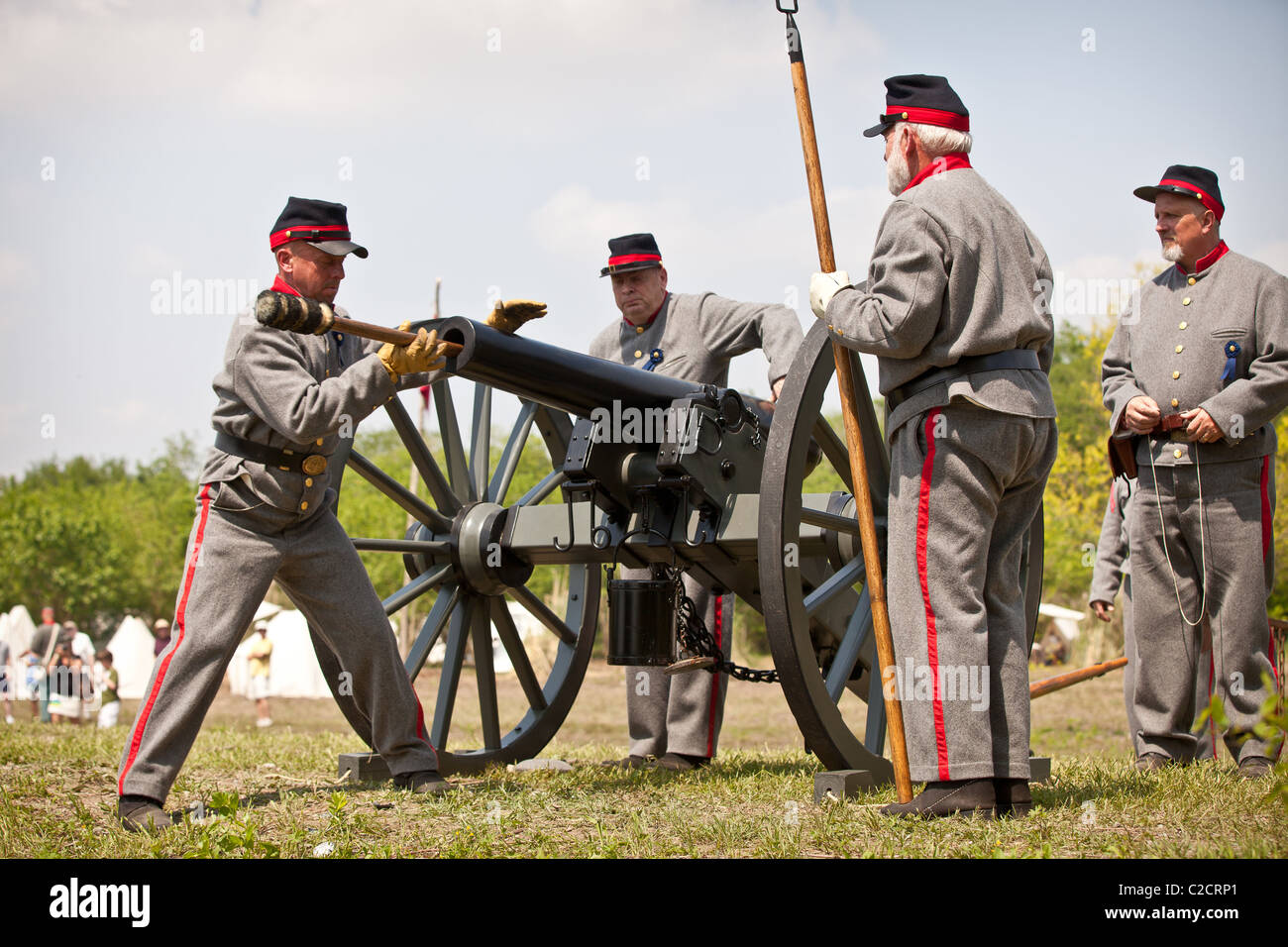 Confederate re-enactors load a canon Charleston, SC marking the 150th ...