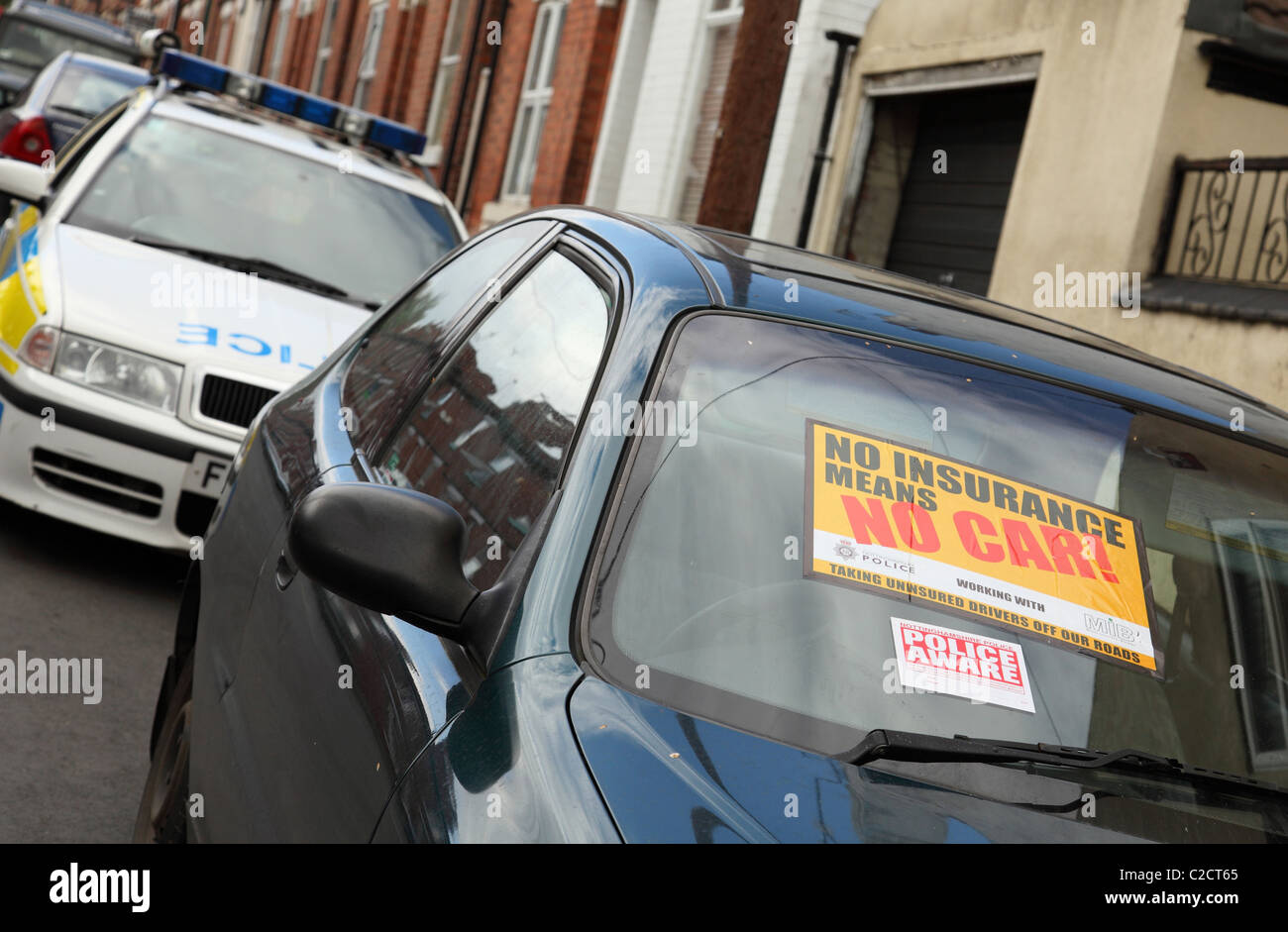 Police seize an uninsured car on a street in Nottingham, England, U.K ...