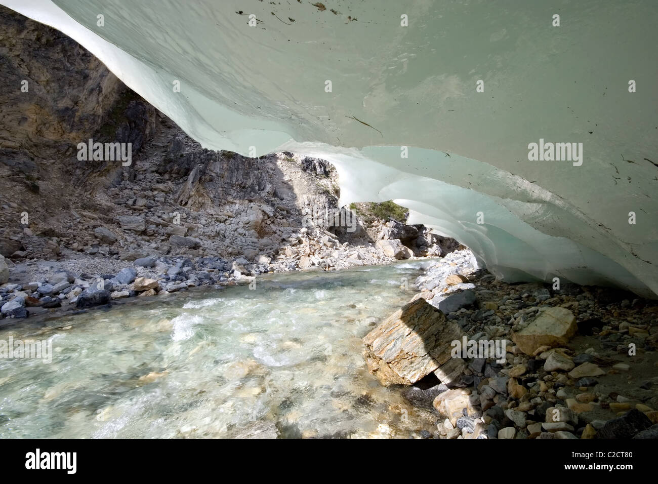 Fantastic wavy ice shape (glacier) near river in East Sayan mountains ...
