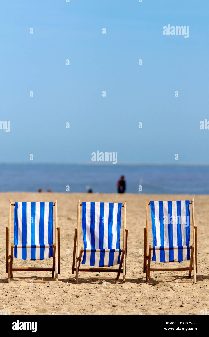 Great Yarmouth, Norfolk. Blue and White Decks chairs on a beach at ...